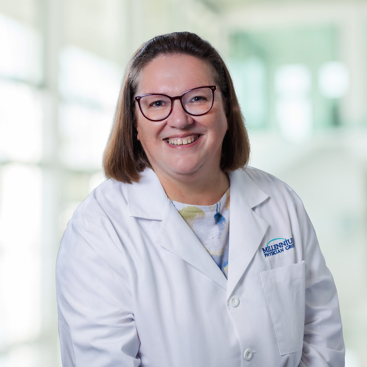 Emily June, MD - Millennium Physician Group